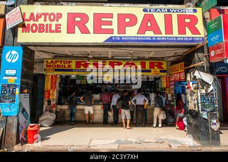 New Delhi, India. 22nd June, 2020. A worker carries a boxes of ...