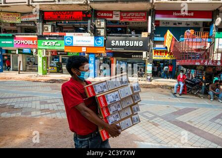 New Delhi, India. 22nd June, 2020. A glimpse of a crowded mobile and ...