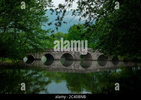 Rimski most or Roman bridge reflecting in the Bosna river Stock Photo ...