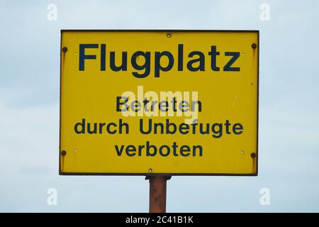 Prohibition sign at the airfield in German. Entry prohibited for ...