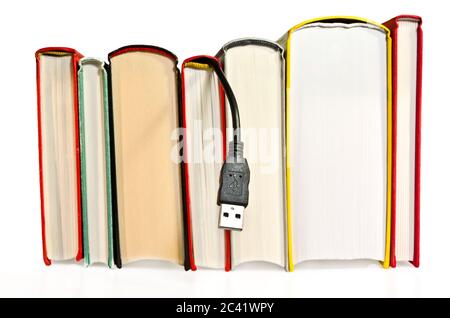 Books with USB cable sticking out Stock Photo - Alamy