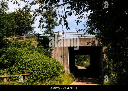 A bridge over the Brampton Valley Way, a disused railway line, now a ...