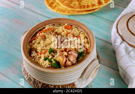 Asian rice - Plov with meat and carrot Stock Photo - Alamy