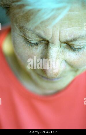 Smiling older woman - facial expressions Stock Photo - Alamy