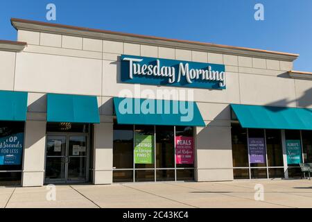 A logo sign outside of a Tuesday Morning retail store location in Bowie ...