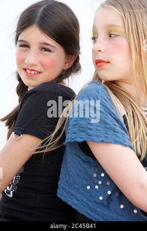 Two smiling girls made up Stock Photo - Alamy