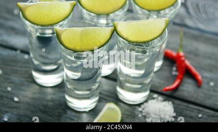 Tequila shots served on table Stock Photo - Alamy