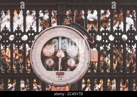 Antique coin operated weighing scale Stock Photo - Alamy