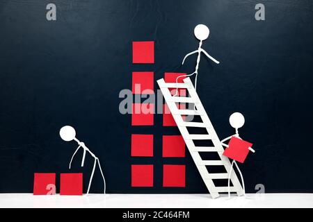 Teamwork, cooperation and rebuilding business concept. Human stick ...