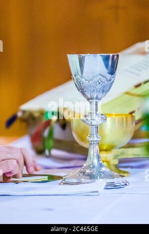 altar with consecrated host that becomes the body of jesus christ and ...