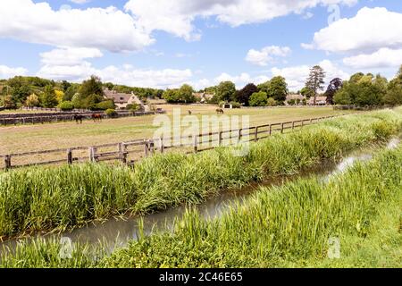 The River Coln passing the Cotswold village of Coln Rogers in the Coln ...