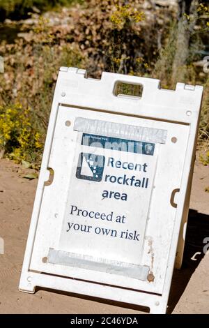 Proceed At Your Own Risk sign Stock Photo - Alamy