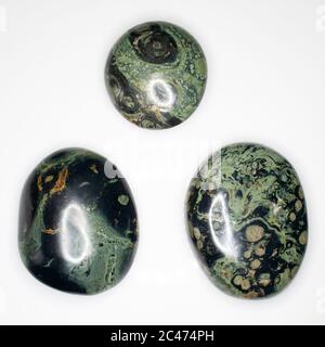 Natural polished jasper kabamba on the white background Stock Photo - Alamy