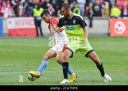 From left Tomas Chory of Slavia and Gabriel of Arsenal in action during ...