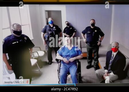 As seen on a courtroom monitor, Jeremy Christian, 38, makes an ...