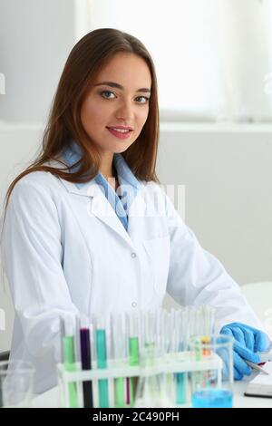 Attractive female laboratory researcher doing medical science ...