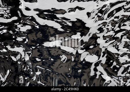 Liquid tar surface for backgrounds Stock Photo - Alamy