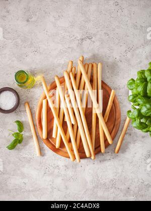 Grissini sticks. Traditional italian bread sticks on black table Stock ...