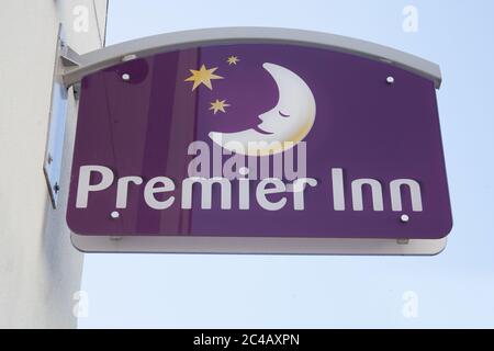 Premier Inn business sign and logo consisting of crescent moon and ...