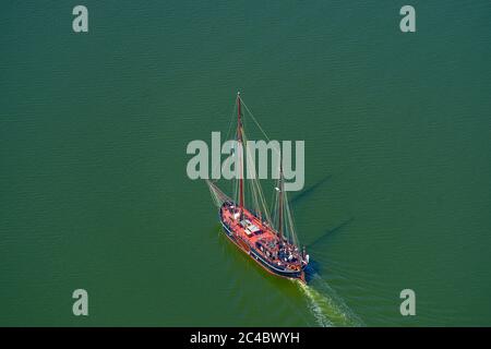 An aerial view of boat sailing on sea surrounded by trees Stock Photo ...