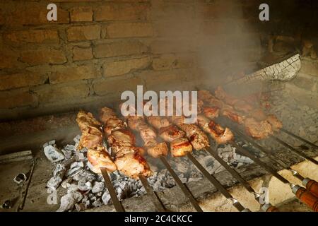 Khorovats or Armenian Barbecue Being Grilled on a Large Clay Oven Stock ...