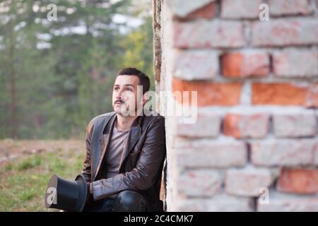 lifestyle young man with mustache, car, rock n roll Stock Photo - Alamy