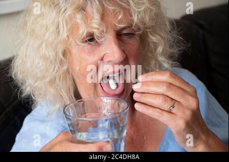 Woman suffering with Shingles rash caused by the varicella-zoster virus ...