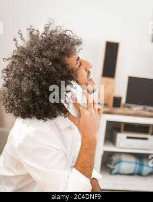 Arabic guy in business center stands smiling walking slow Stock Photo ...
