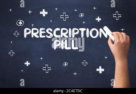 Hand drawing PRESCRIPTION PILL inscription with white chalk on ...