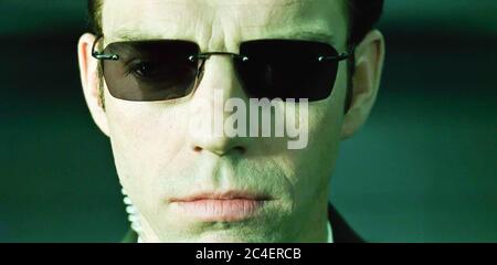 USA. Hugo Weaving in a scene from the ©Warner Bros film : The Matrix ...