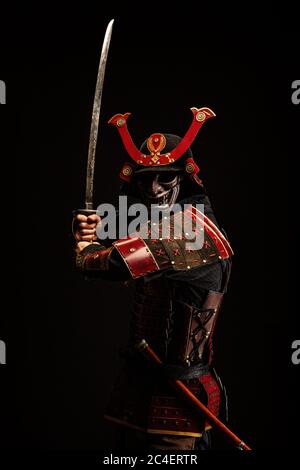 Portrait of a samurai in armor in attack position Stock Photo - Alamy