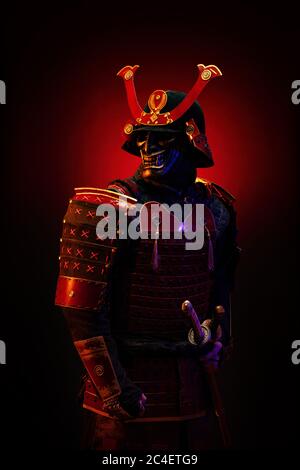 Portrait of a samurai in red armor in profile, his katana on his ...