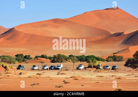 SOSSUSVLEI, NAMIBIA - JAN 29, 2016: Unidentified man descends from the ...