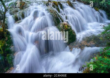 Beautiful and fresh scenery at waterfall with stacking cascade, green ...