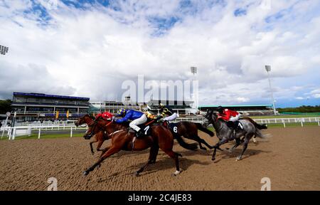 Great Colaci ridden by Joe Fanning (red silks) wins The Betfair Weighed ...