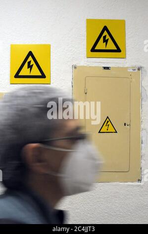Electrical risk signal for use within the workplace Stock Photo - Alamy