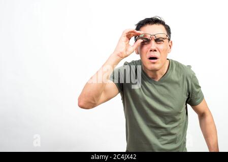 adult with glasses straining his eyes because he can't see, isolated ...