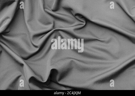 Polyester wrinkle black fabric texture Stock Photo - Alamy