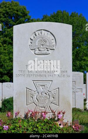 Grave of the Australian Victoria Cross recipient sergeant Lewis McGee (1888-1917) at Tyne Cot ...