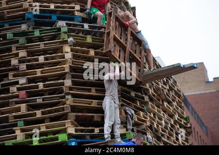 Building a bonfire in Sandy Row, Belfast for the eleventh night party ...