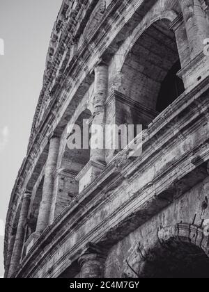 A vertical shot of columns of the Colosseum, Rome Stock Photo - Alamy