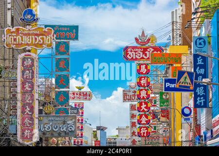 BANGKOK, THAILAND - SEPTEMBER 27, 2015: Colorful signs line Yaowarat Road in the Chinatown ...