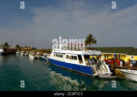 Boats docked at West End harbor, Bahamas Stock Photo - Alamy
