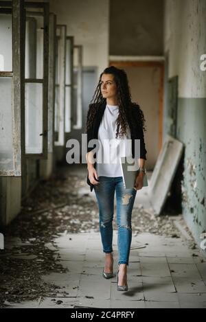 Young beautiful elegant business woman over isolated background ...