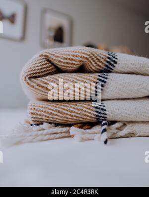 Stacked Knitted Plaid with Fringe Stock Photo - Alamy