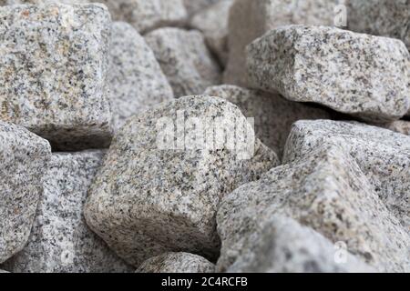 Pile of granite paving stones in closeup Stock Photo - Alamy