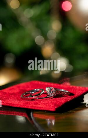 Rings on red mat Stock Photo - Alamy