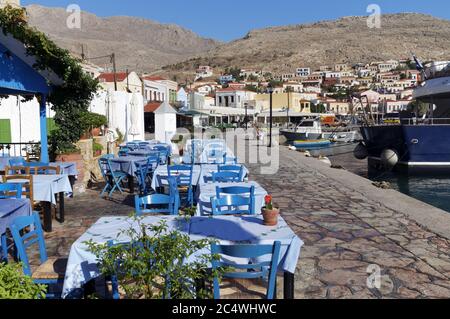 Harbour side Taverna, Village of Emborio, Chalki Island near Rhodes ...
