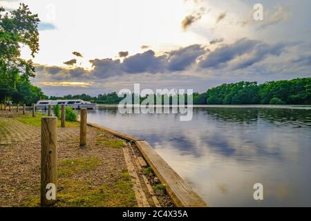 A quiet sunset on Salhouse Broad in the heart of the Norfolk Broads ...