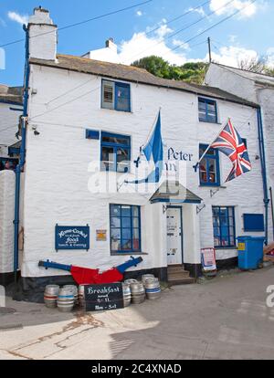 Blue Peter Inn Polperro Harbour at night Cornwall England Stock Photo ...